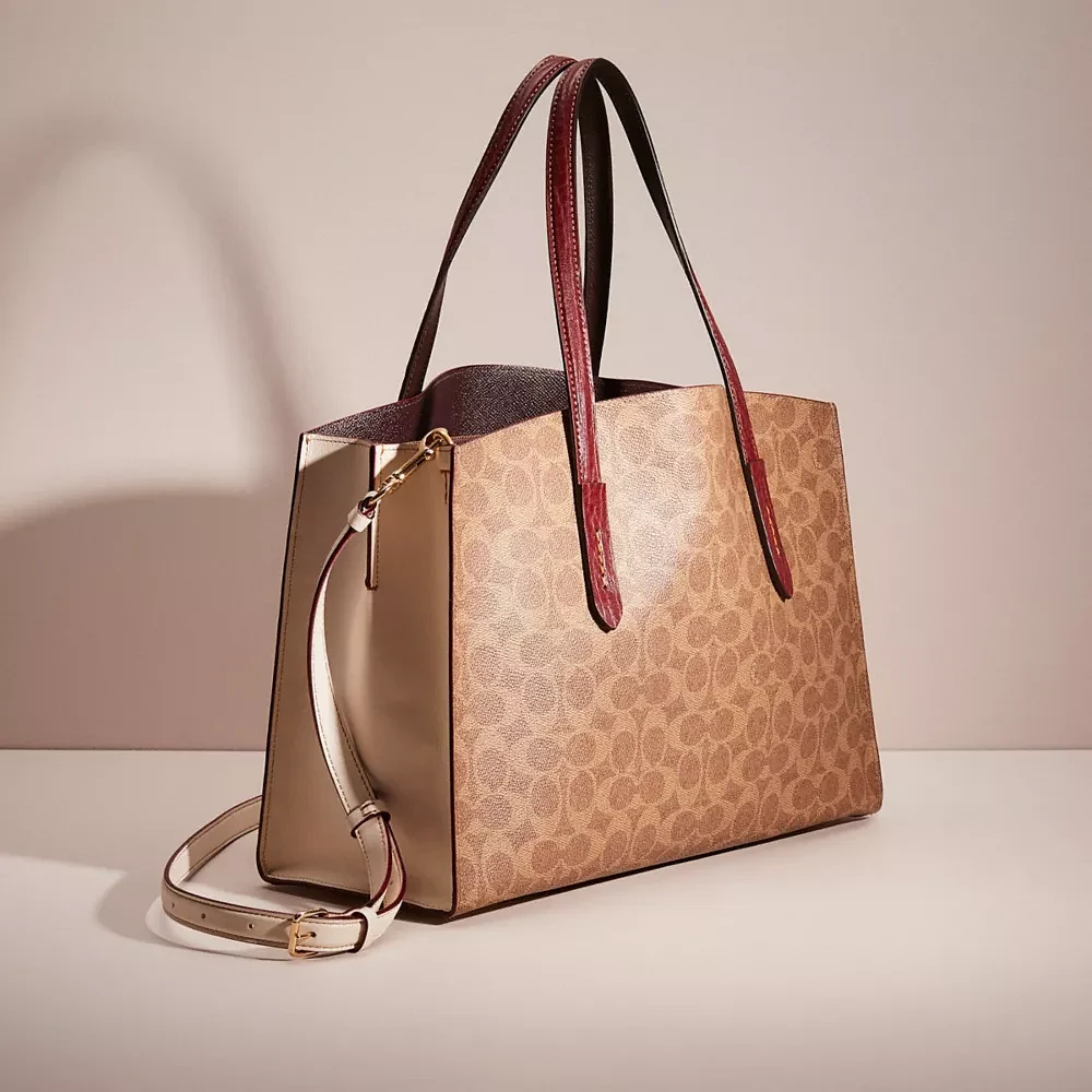 Coach Upcrafted Charlie Carryall In Signature Canvas | Mall of America®
