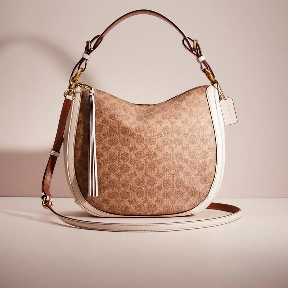 Coach Restored Sutton Hobo Signature Canvas | Mall of America®